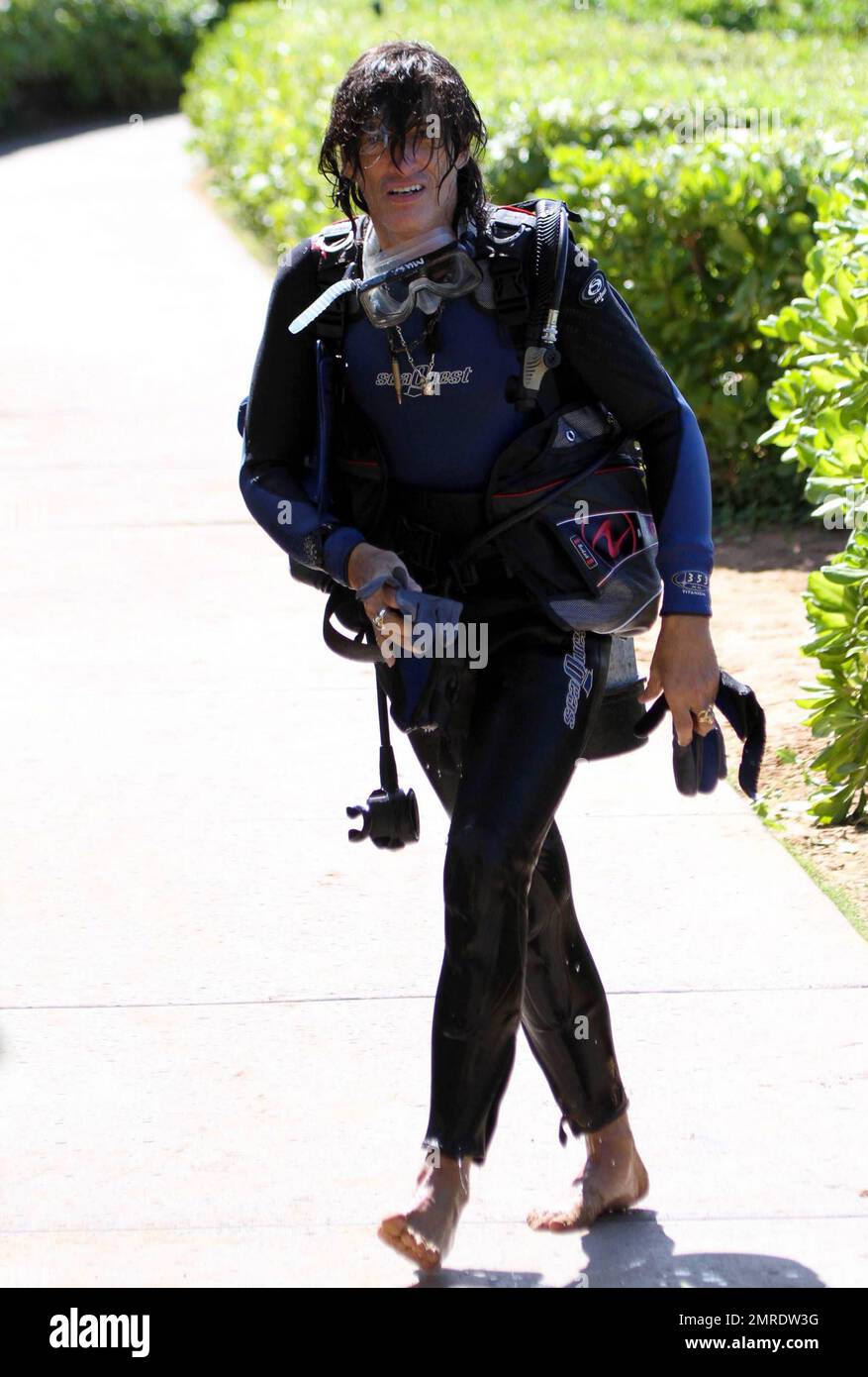 Aerosmith guitarist Joe Perry spends a day on the beach with wife ...