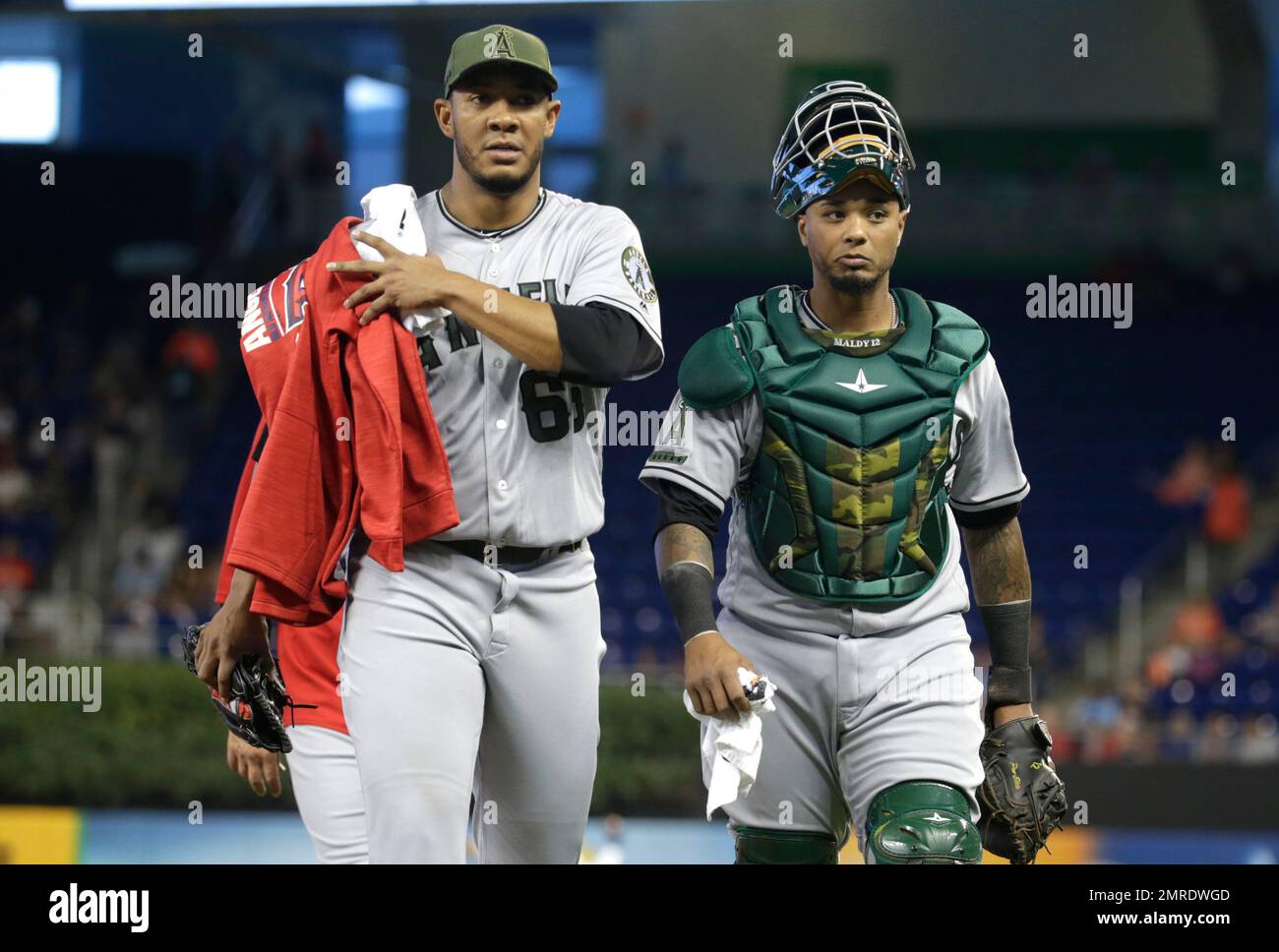 Los Angeles Angels starting pitcher JC Ramirez, left, and catcher ...