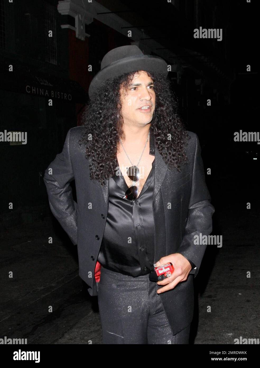 Velvet Revolver guitarist Slash and his wife Perla Ferrar attend rocker ...
