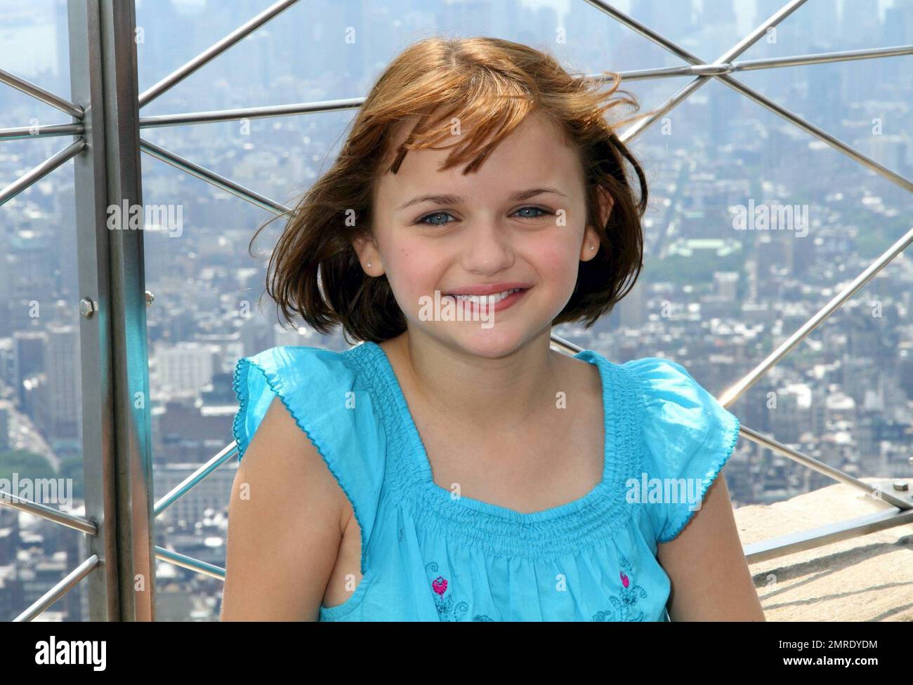 Joey King poses for photos on top of the Empire State Building during a ...