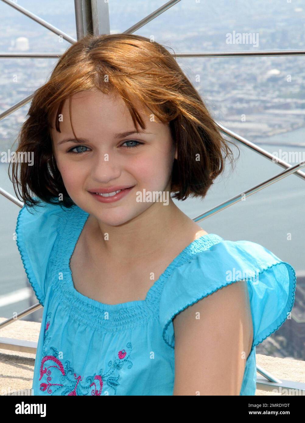 Joey King poses for photos on top of the Empire State Building during a ...