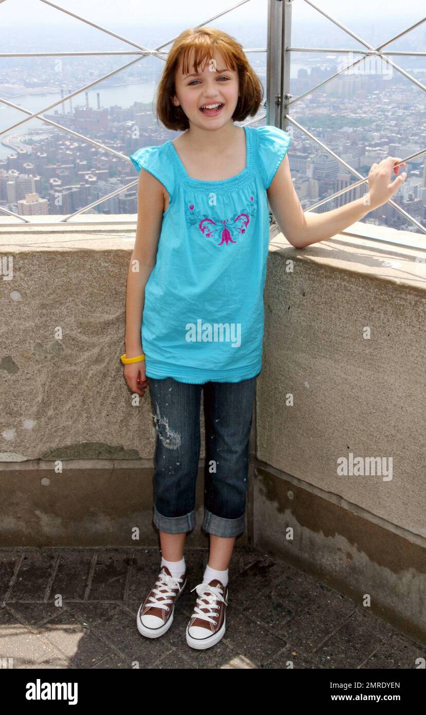 Joey King poses for photos on top of the Empire State Building during a ...