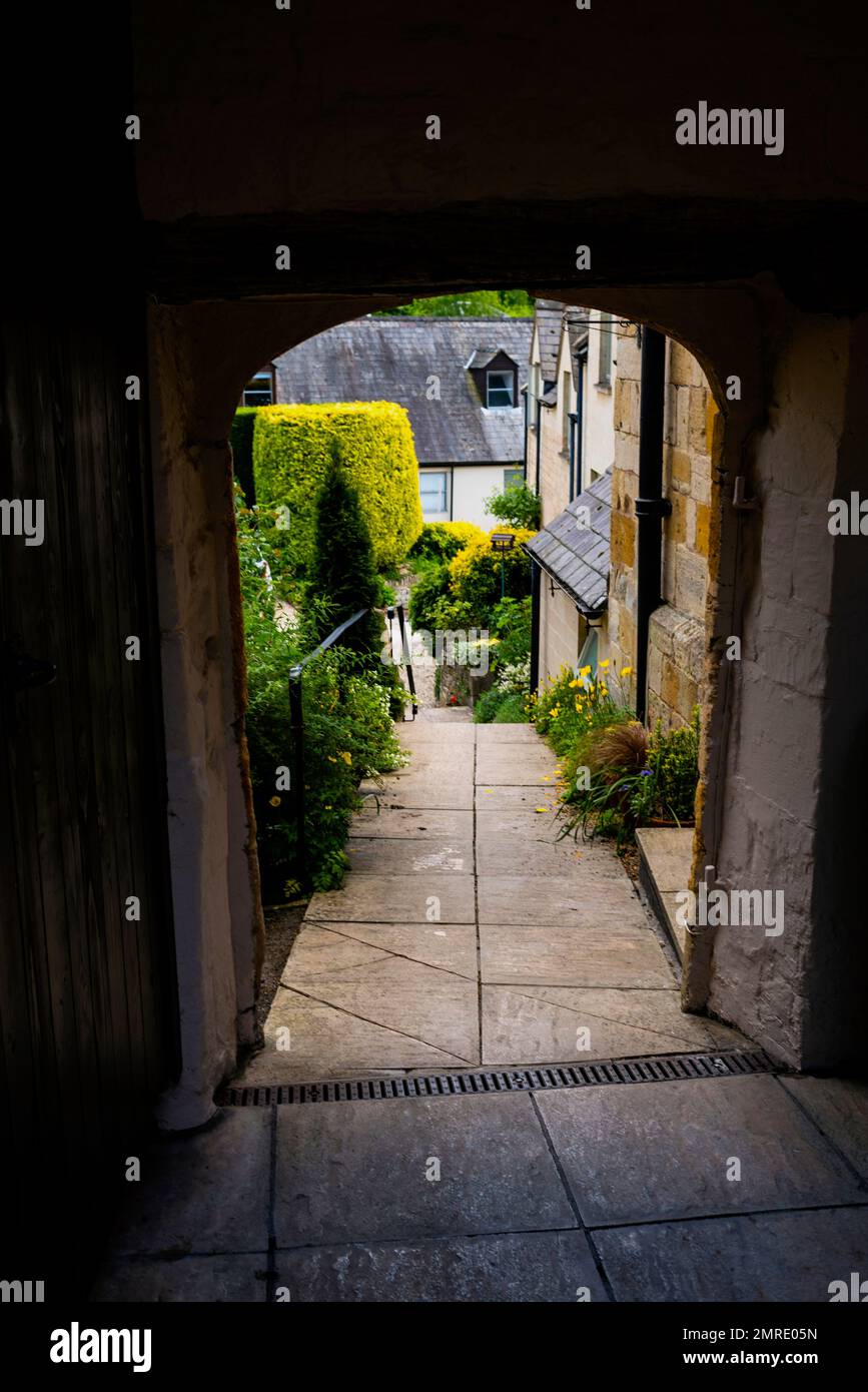 Arched passage in the Cotswold Market town of Winchcombe, England Stock ...