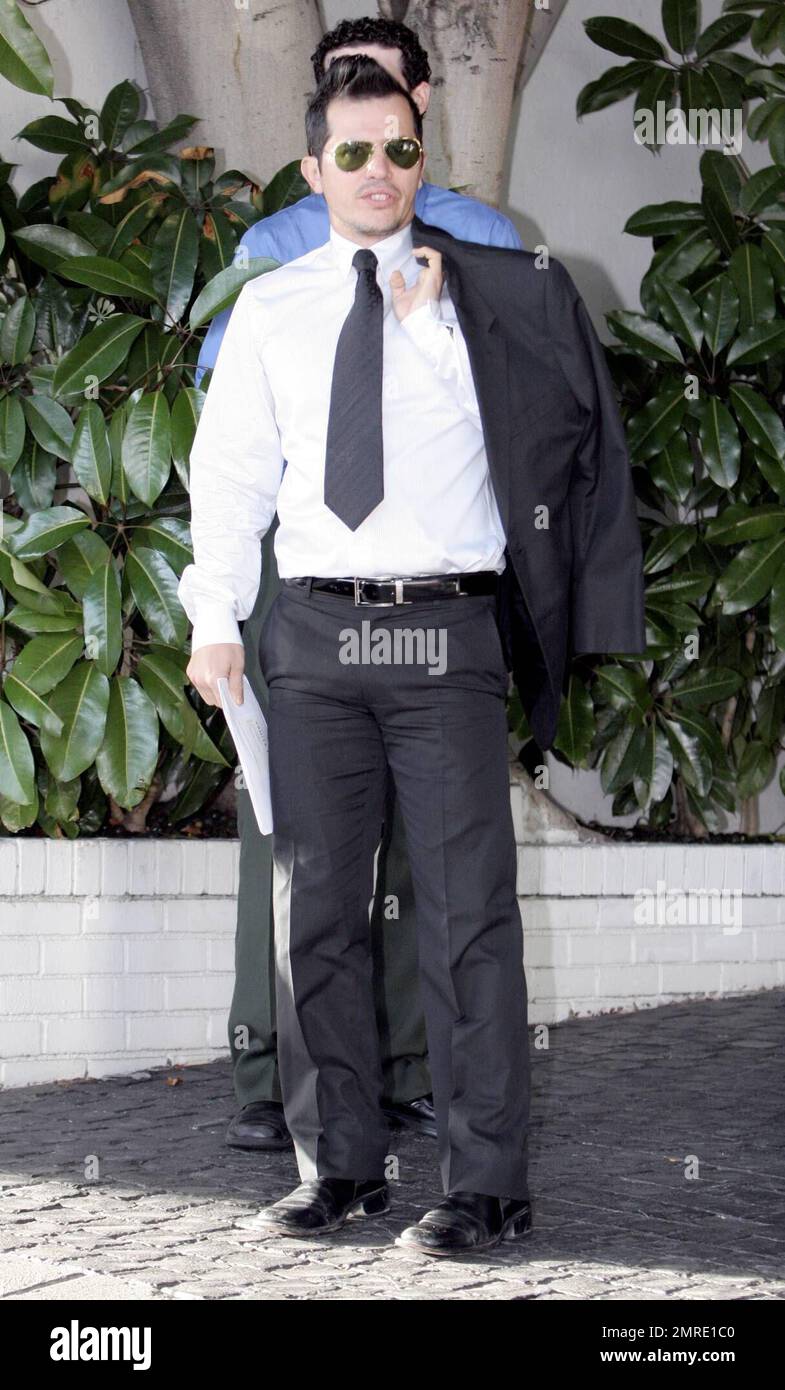 Columbian born actor John Leguizamo leaves his hotel to make his way to ...