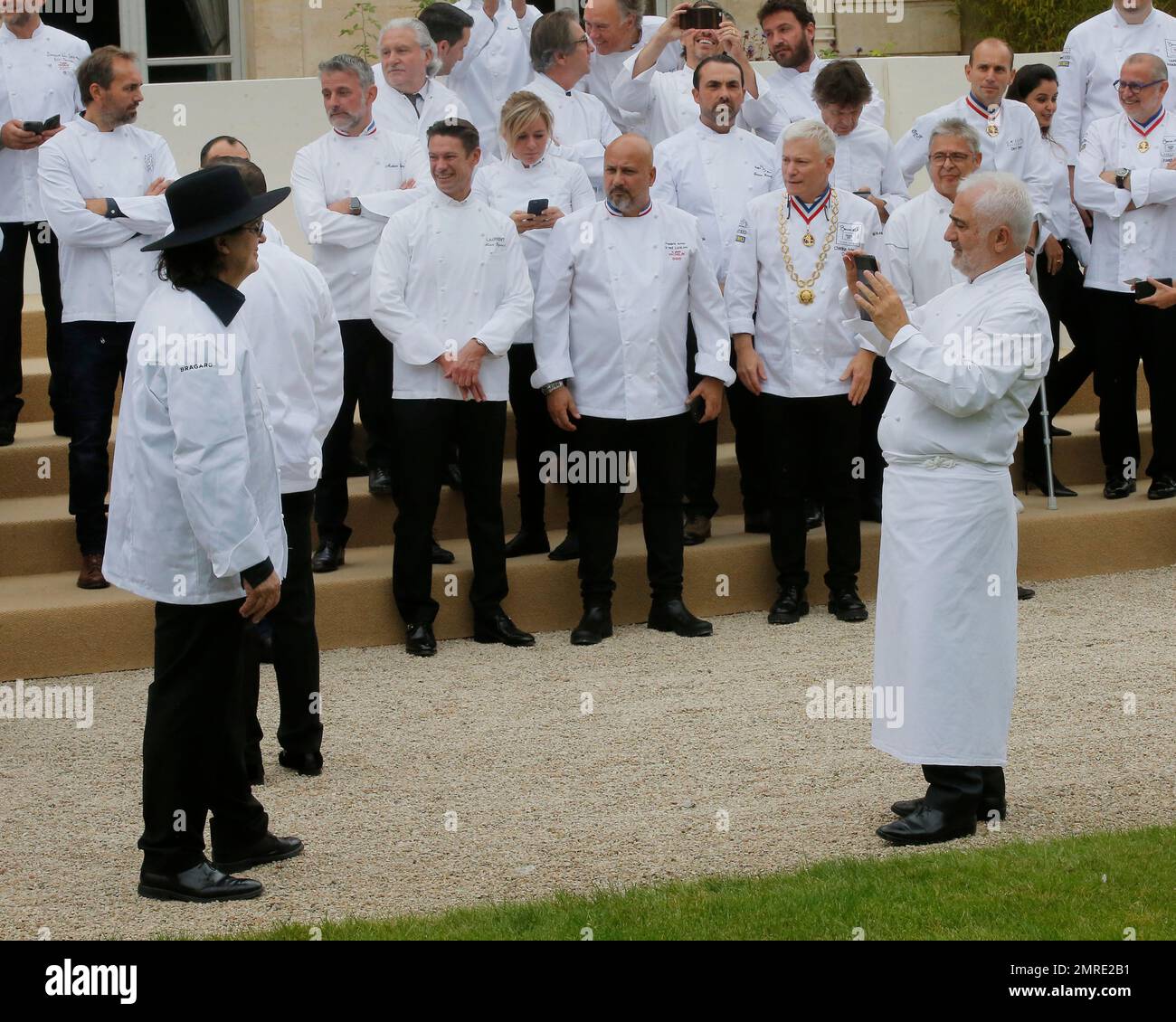 Chef Marc Vayrat is photographed by chef Guy de Savoy during an event ...