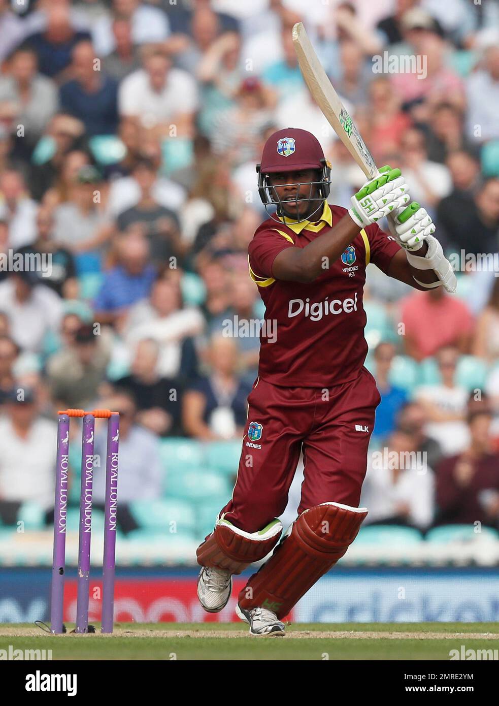 West Indies' Jason Mohammed plays a shot off the bowling of England's ...