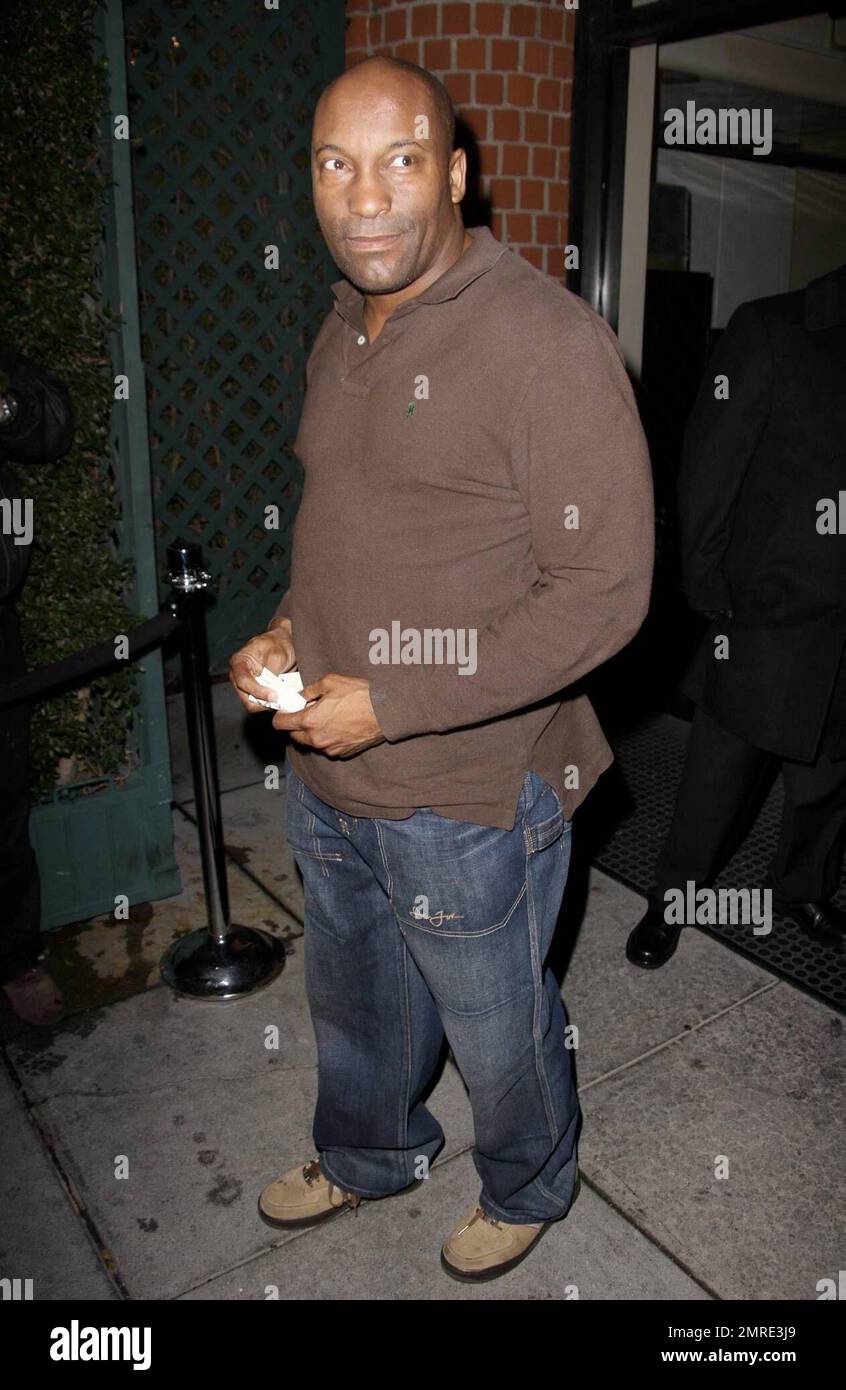 Director John Singleton leaves the restaurant Mr. Chow after having ...