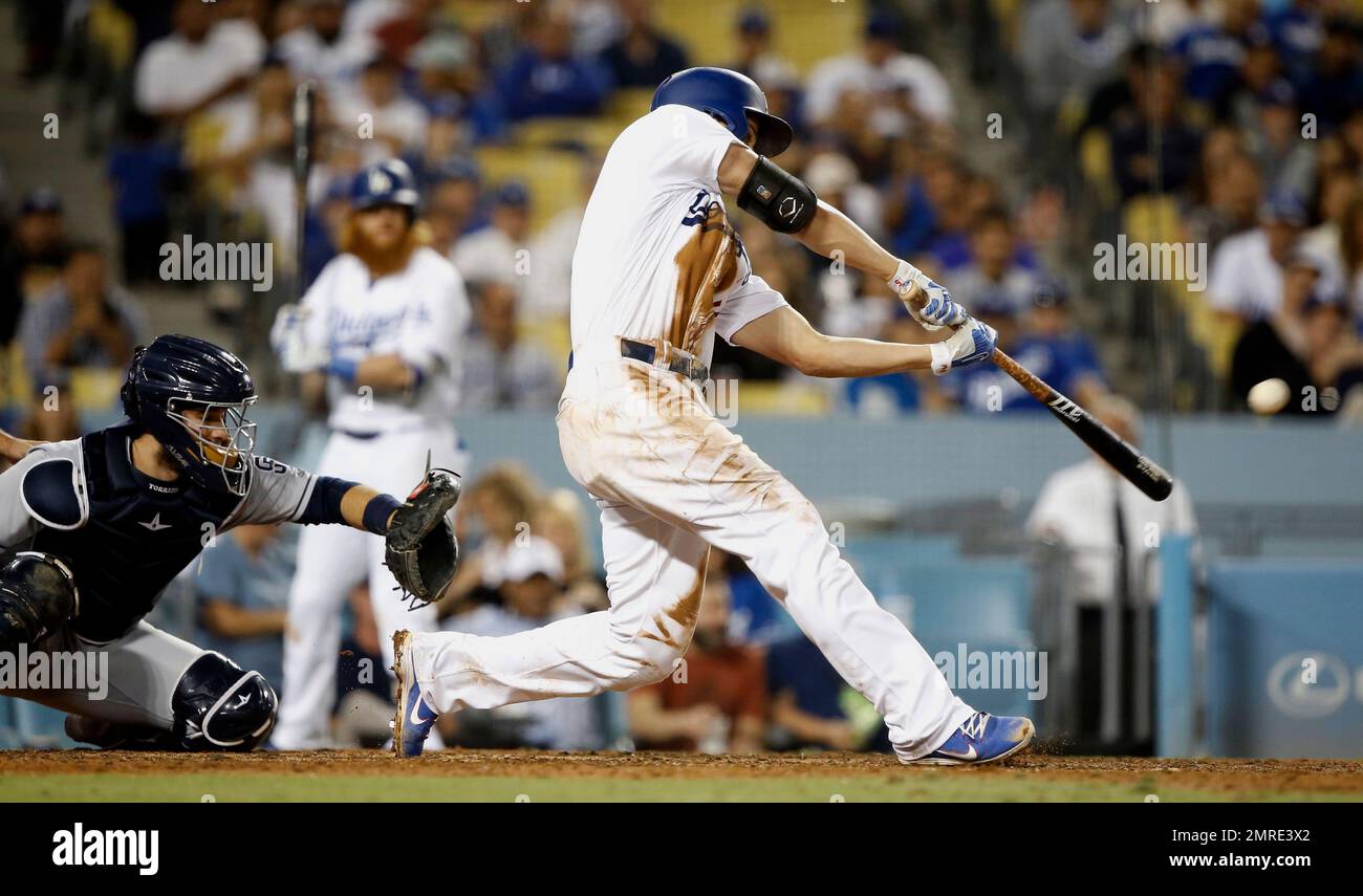 Los Angeles Dodgers' Corey Seager, right, hits a three-run home run ...