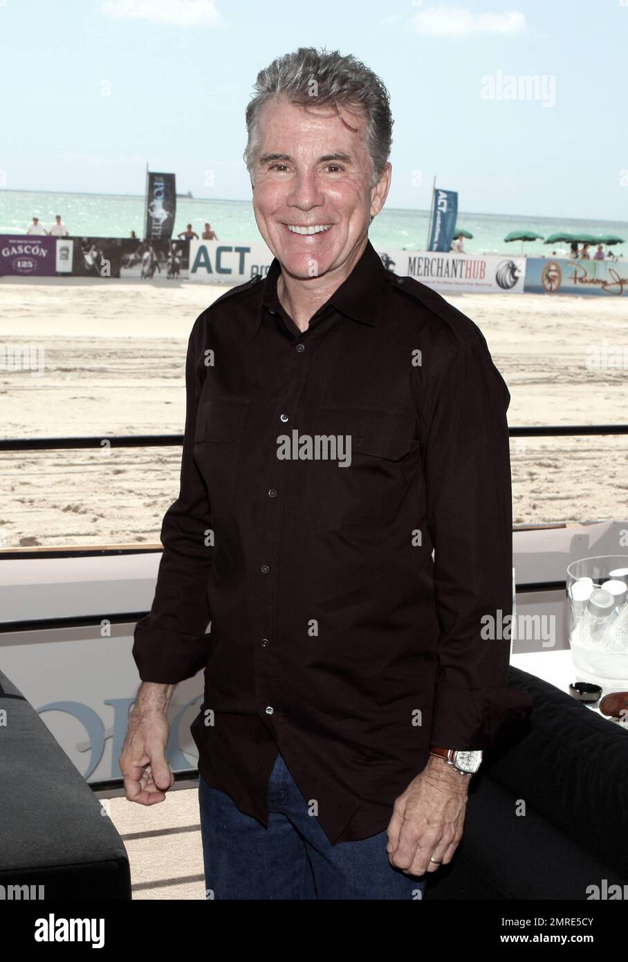 John Walsh and daughter Megan pose for photos at the VIP tent during ...