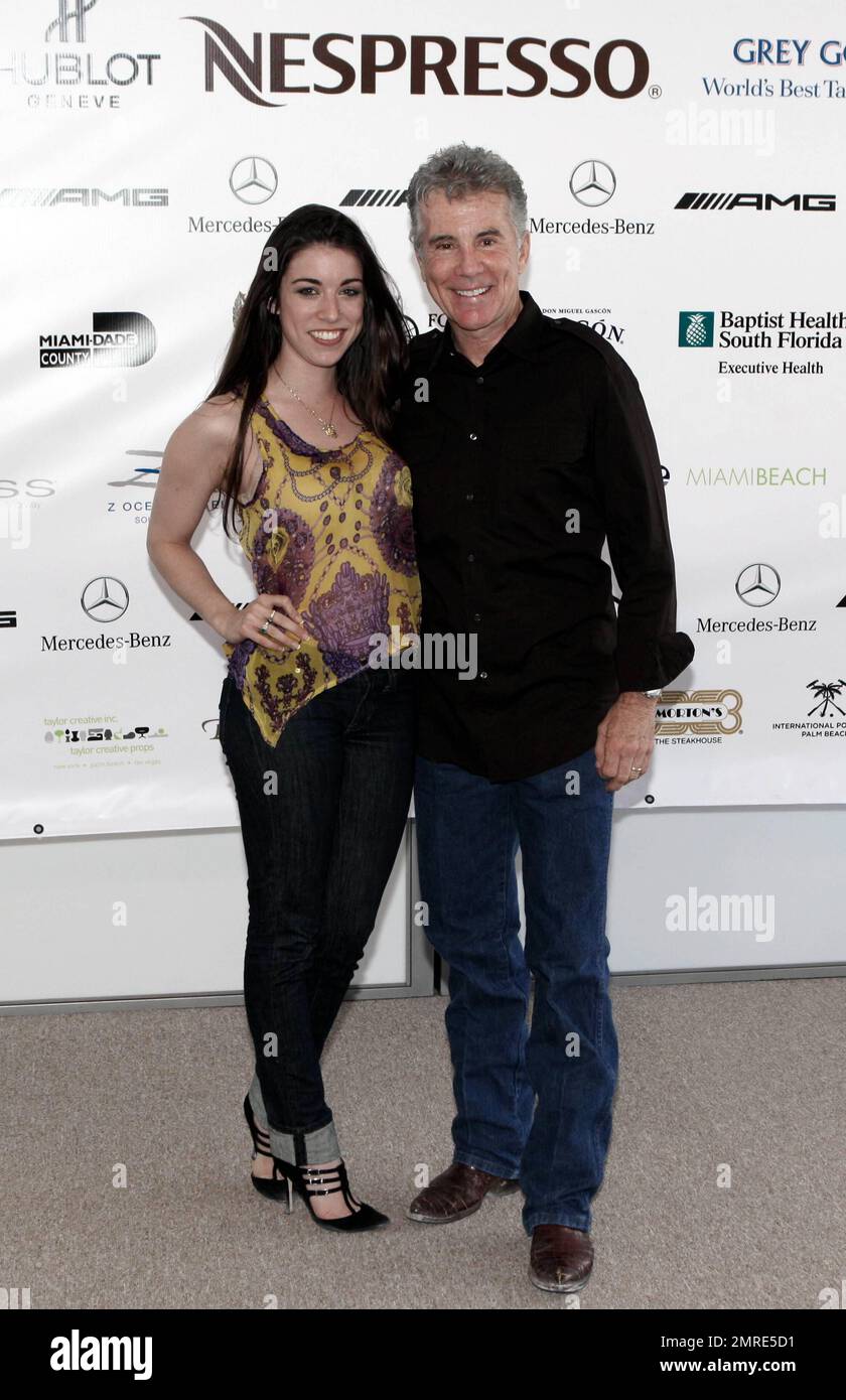 John Walsh and daughter Megan pose for photos at the VIP tent during ...