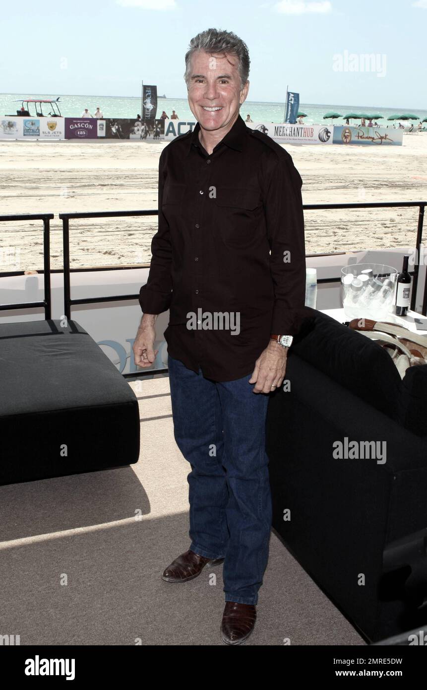 John Walsh and daughter Megan pose for photos at the VIP tent during ...