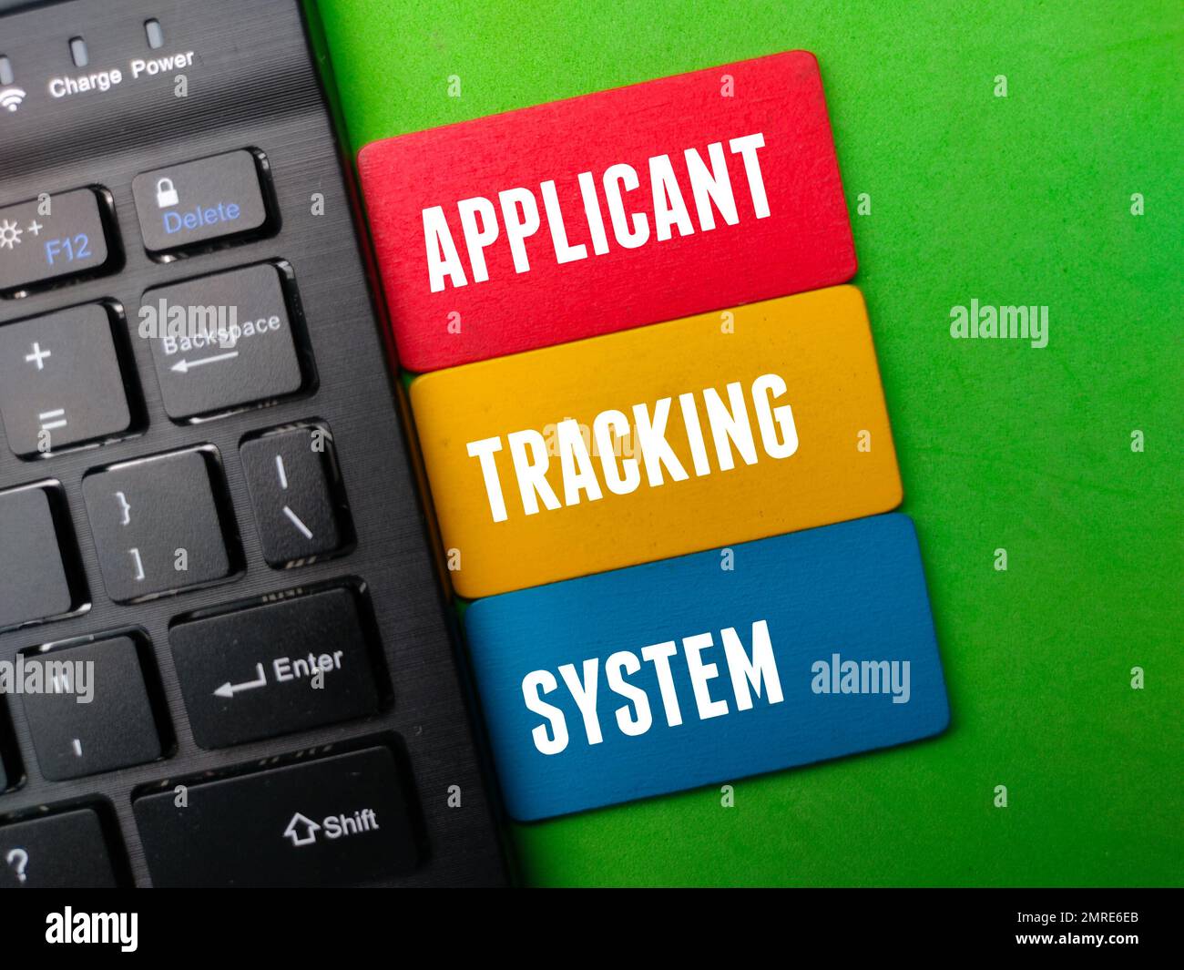 Black wireless keyboard with the word APPLICANT TRACKING SYSTEM Stock ...