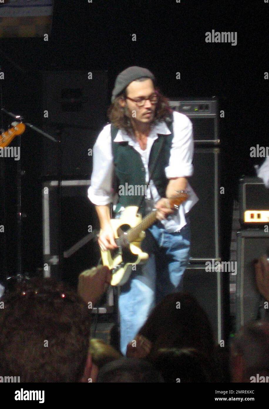 Heart throb actor Johnny Depp joined his old band 'The Kids" on stage ...