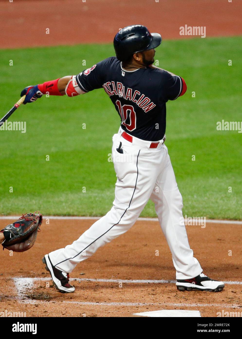 Cleveland Indians' Edwin Encarnacion hits a two RBI single off ...