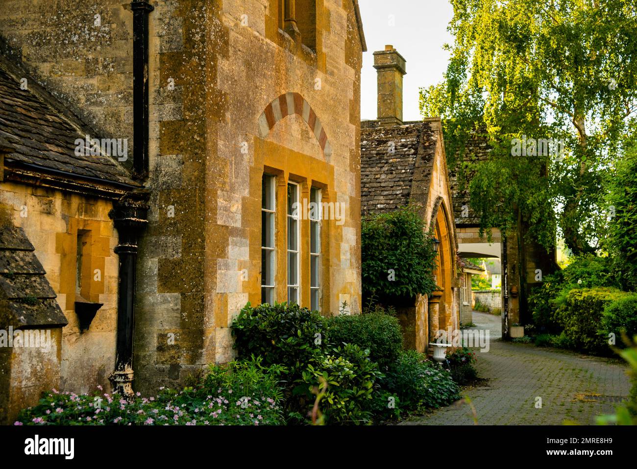 Terraced house on Gloucester Street in Winchcombe, England with red ...