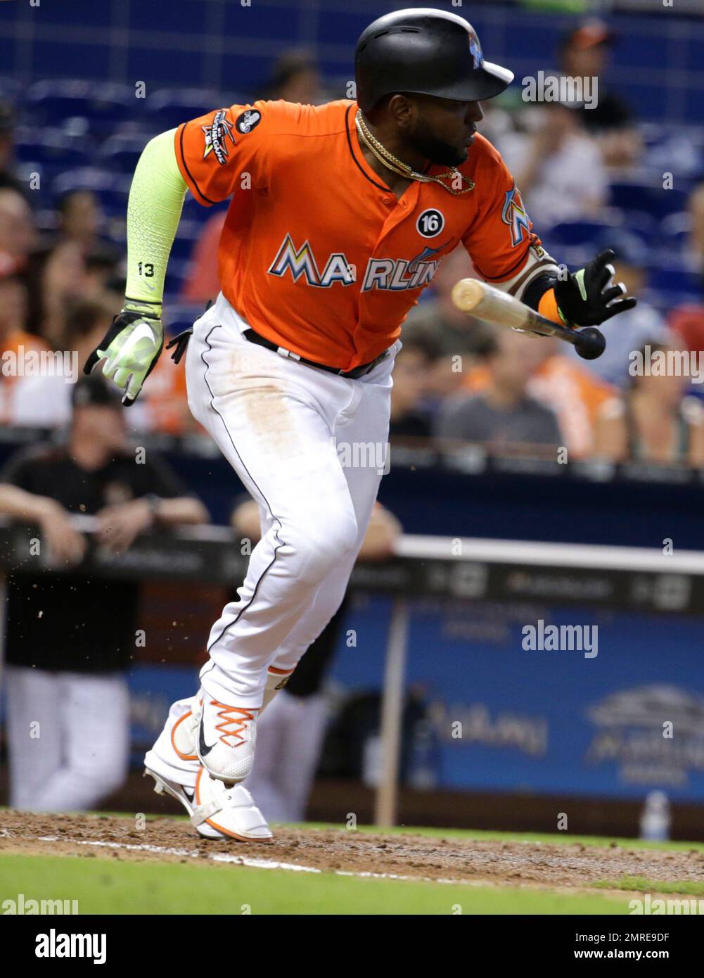 Miami Marlins' Marcell Ozuna runs after hitting a single during a ...