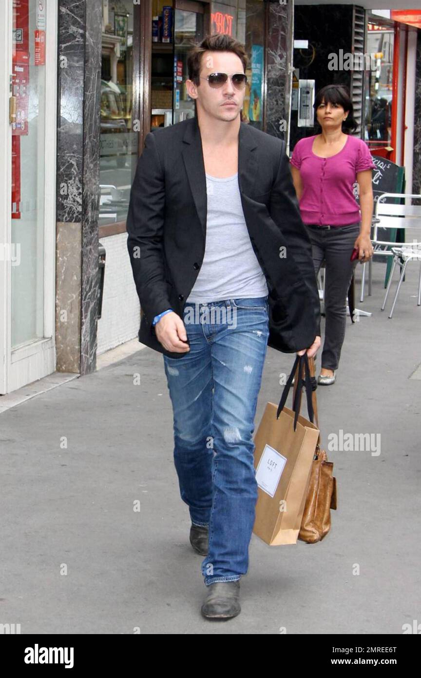 EXCLUSIVE!! Bad-boy actor Jonathan Rhys-Meyers carries a man bag as he ...