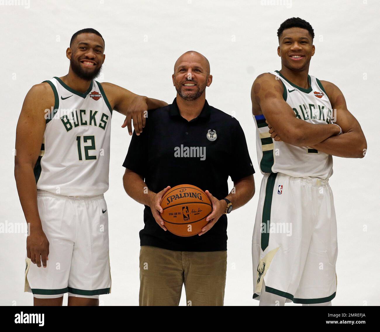Milwaukee Bucks' Jason Kidd, middle, poses with Jabari Parker, left ...