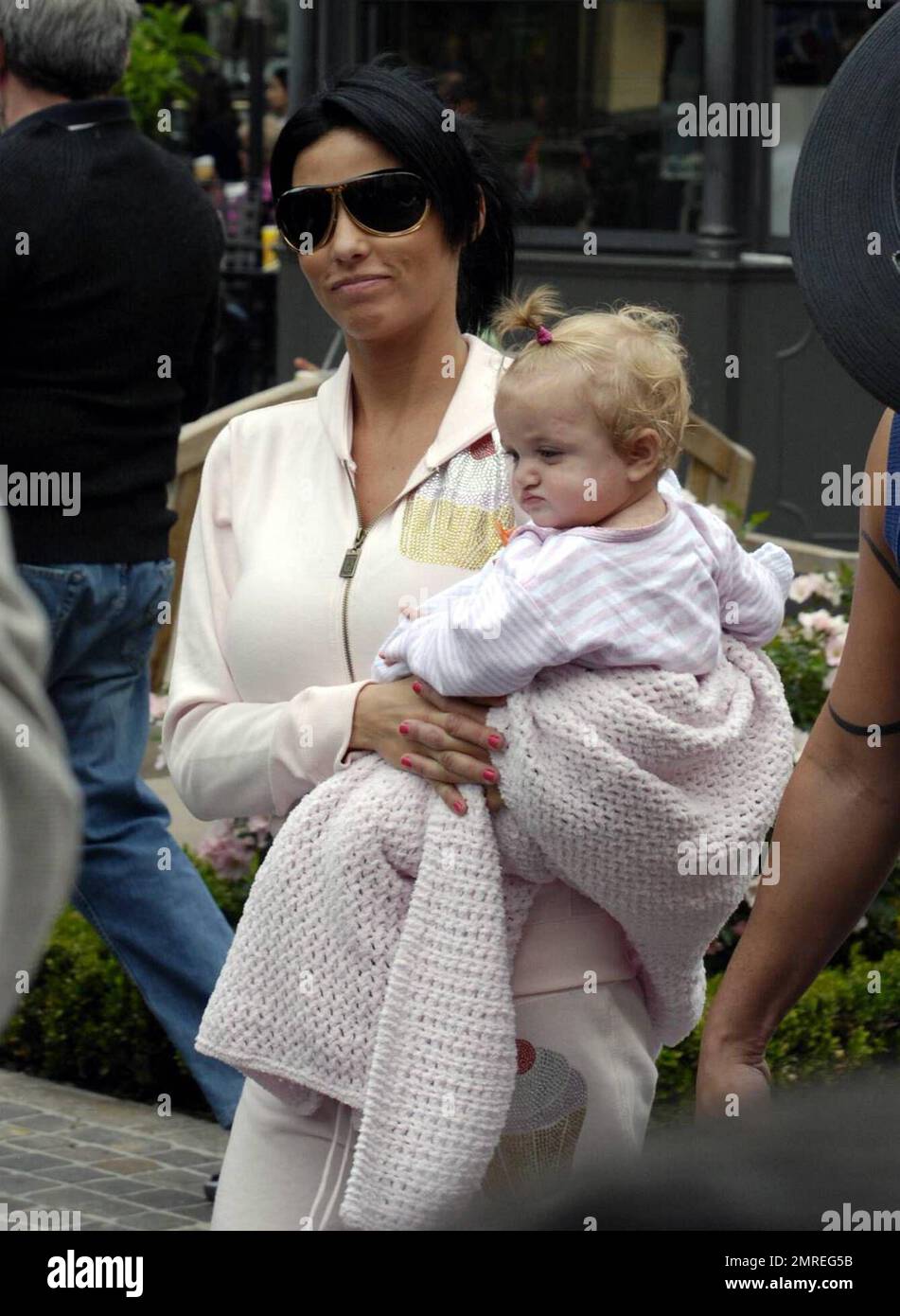 Jordan, hubby Peter Andre and two of the couple's three children ...