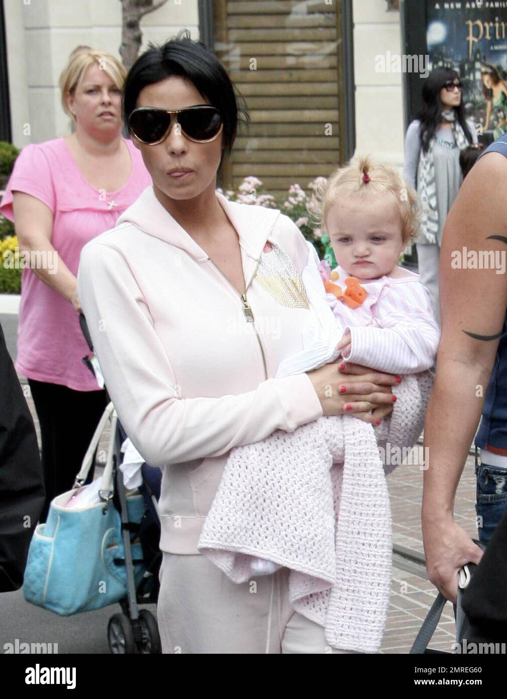 Jordan, hubby Peter Andre and two of the couple's three children ...