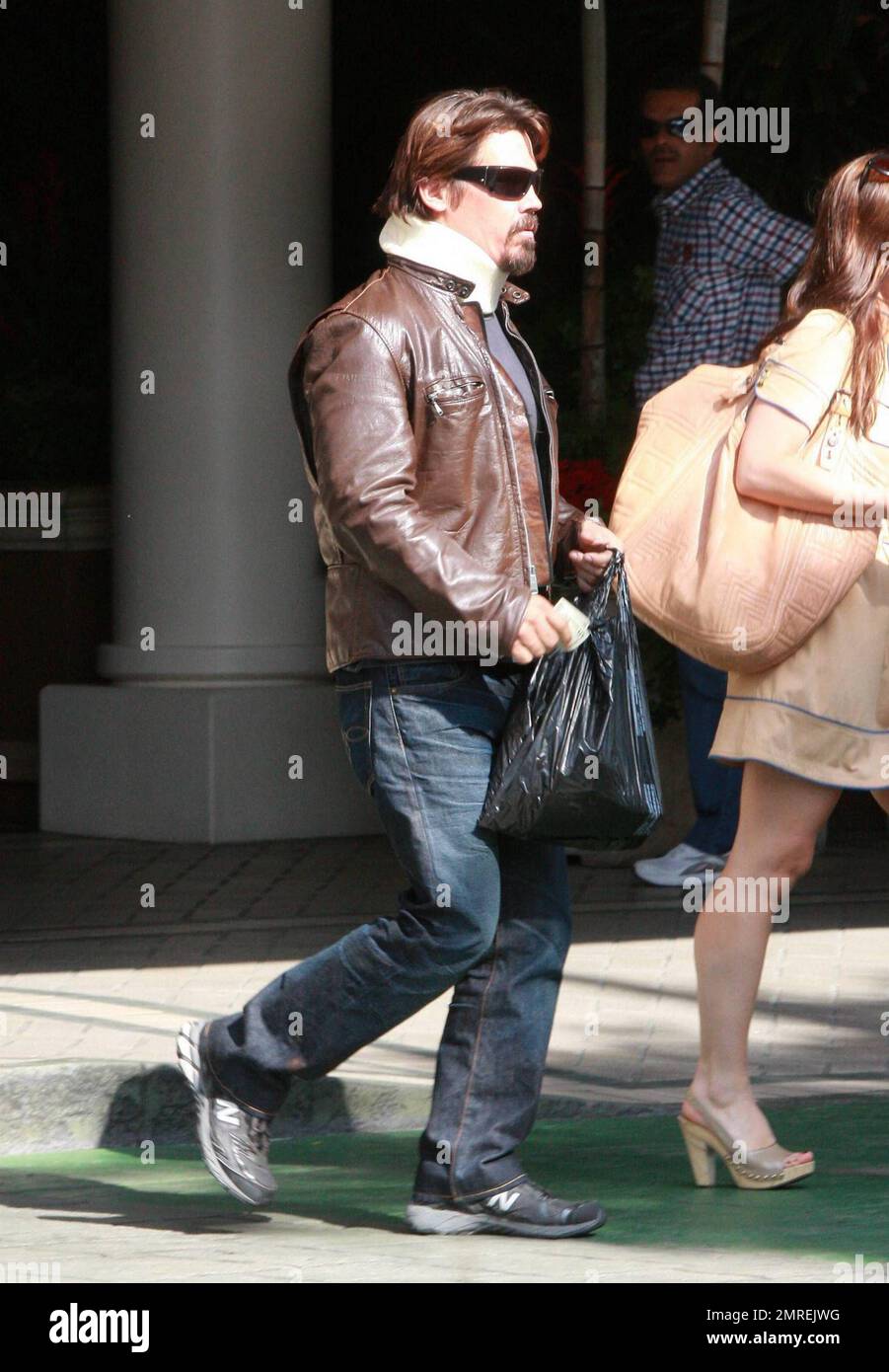Actor Josh Brolin leaves the luxury Four Seasons hotel wearing a neck ...