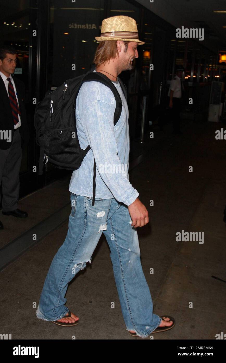 "Lost" actor Josh Holloway at LAX with wife Yessica Kumala and their ...