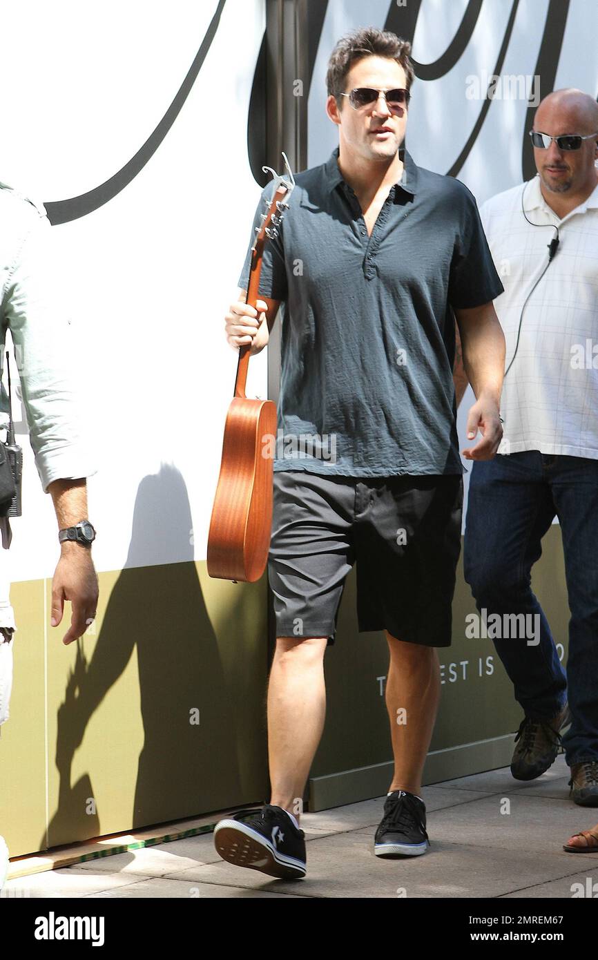 "Cougar Town" star Josh Hopkins carries a guitar while out and about at ...