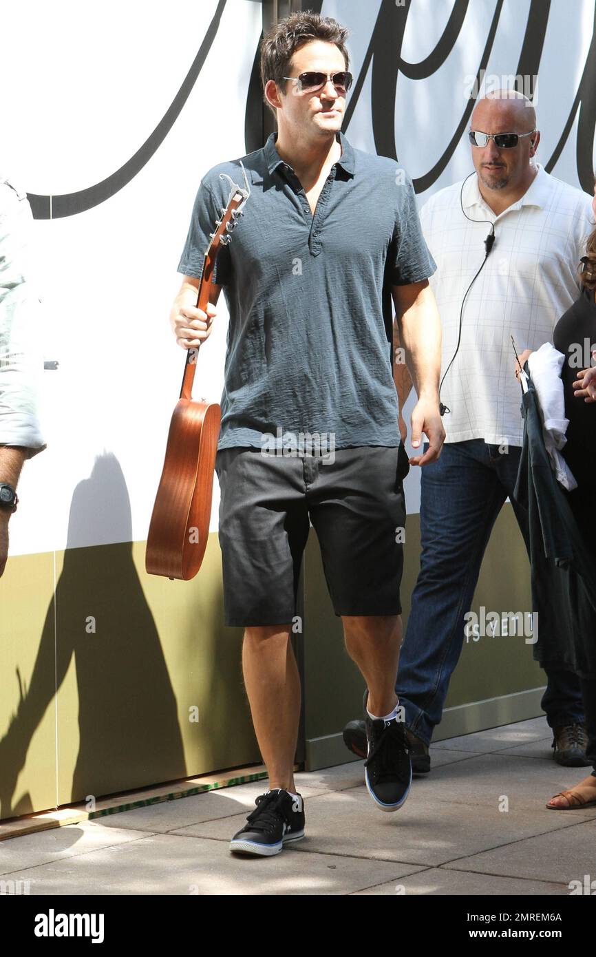 "Cougar Town" star Josh Hopkins carries a guitar while out and about at ...