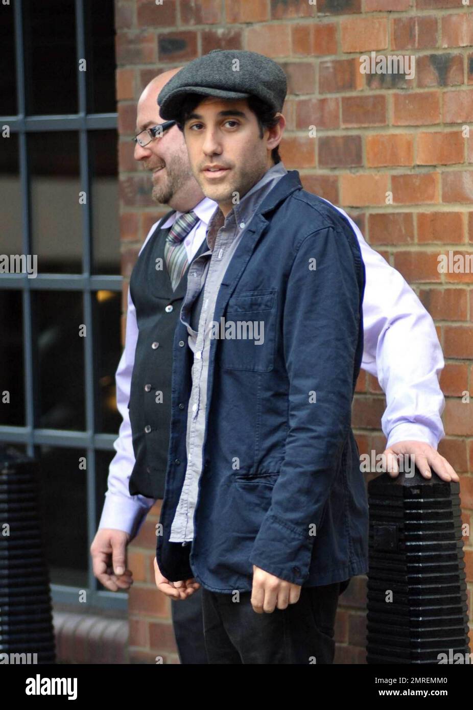 Singer Joshua Radin waits for his car outside his hotel in London, UK ...