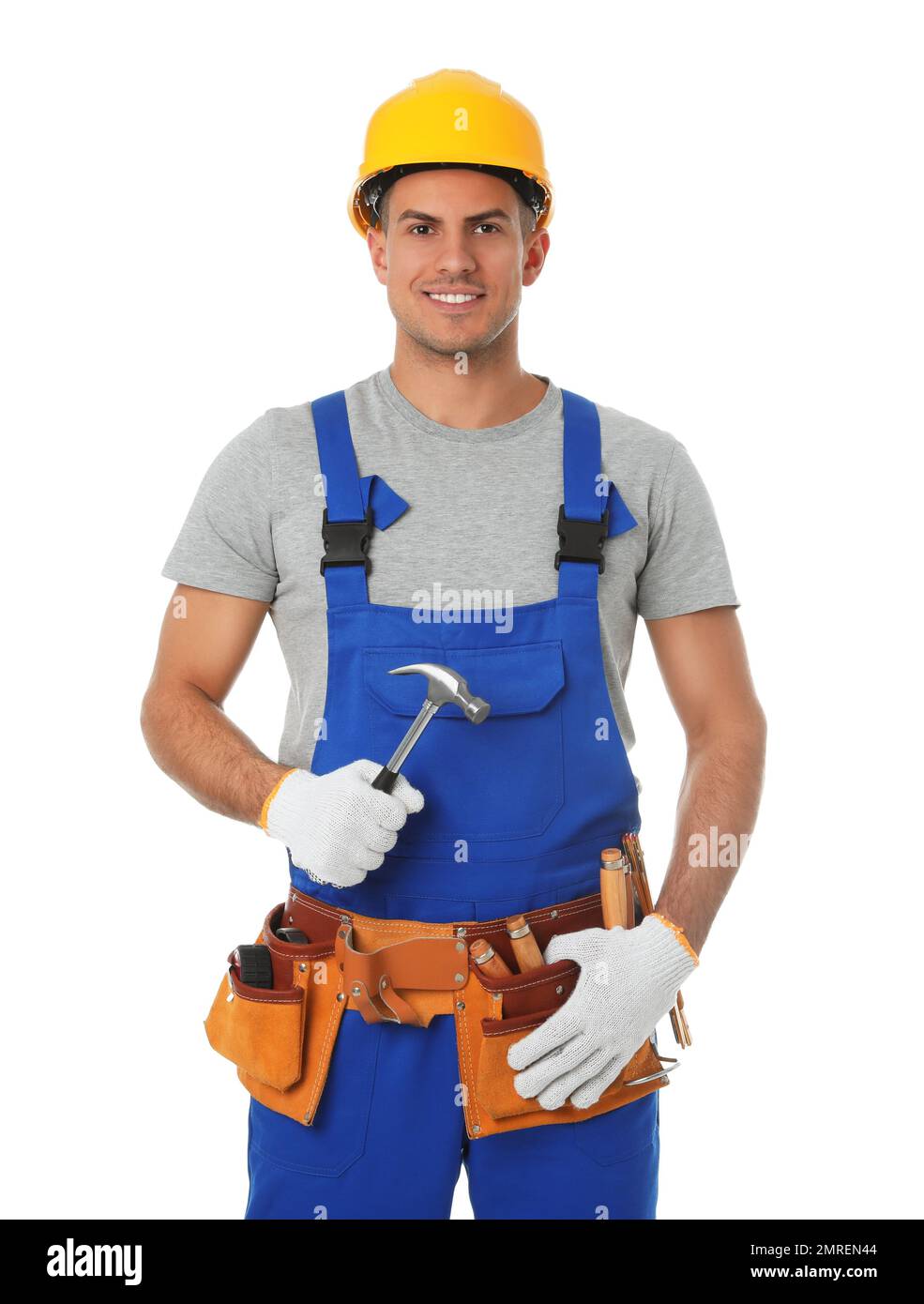 Handsome carpenter with hammer isolated on white Stock Photo - Alamy