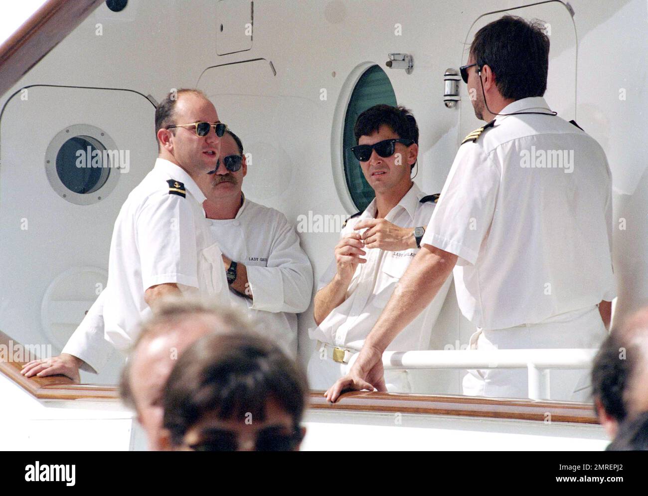 Unidentified crew members stand of the deck of the Lady Ghislaine in ...