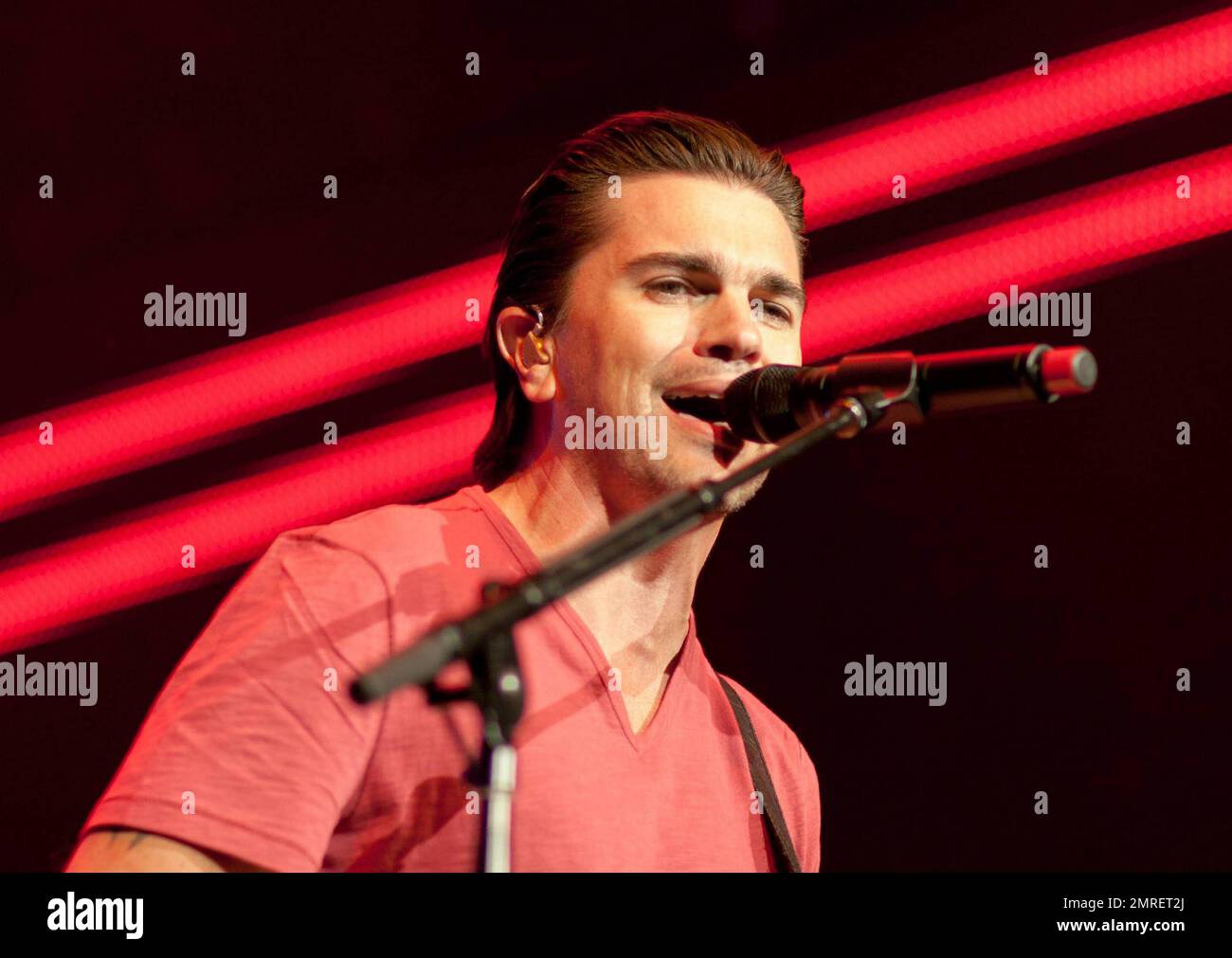 In skinny jeans and a red shirt Colombian musician Juanes (aka Juan ...