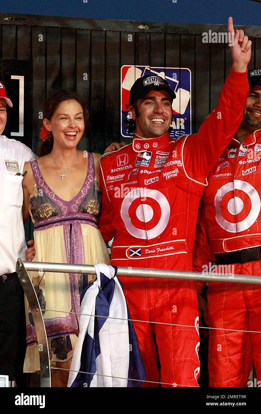 Actress Ashley Judd watches her husband Dario Franchitti celebrate his ...