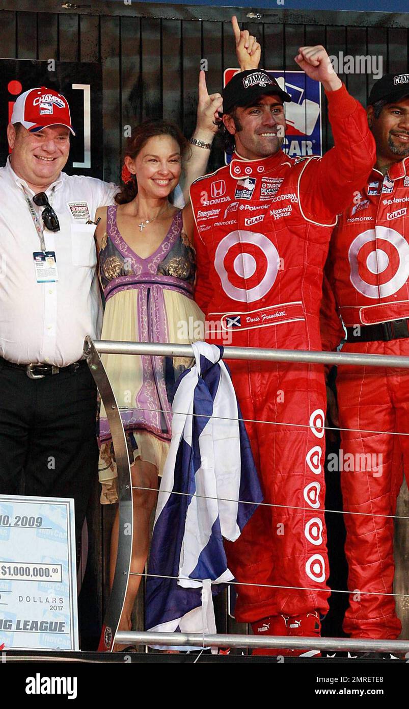 Actress Ashley Judd watches her husband Dario Franchitti celebrate his ...