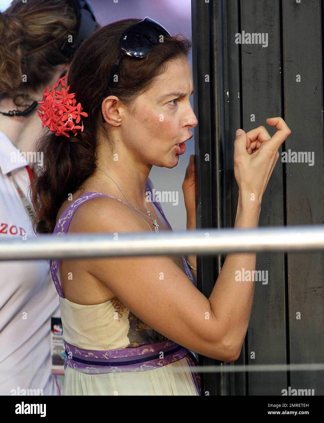 Actress Ashley Judd watches her husband Dario Franchitti celebrate his ...