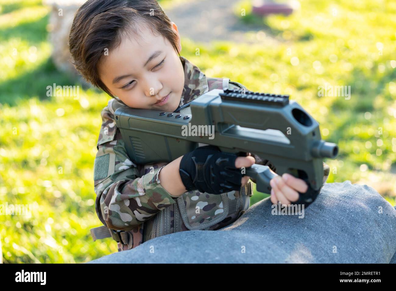 Happy boy playing cs Stock Photo - Alamy