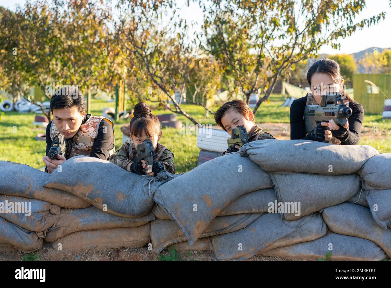 Happy family play cs Stock Photo - Alamy