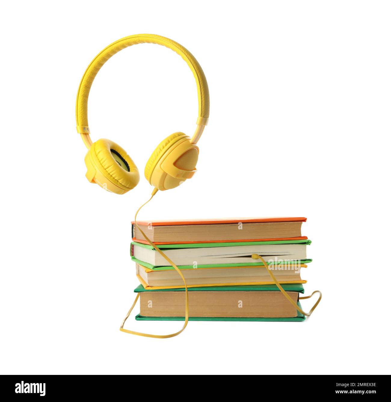 Books and modern headphones isolated on white Stock Photo - Alamy