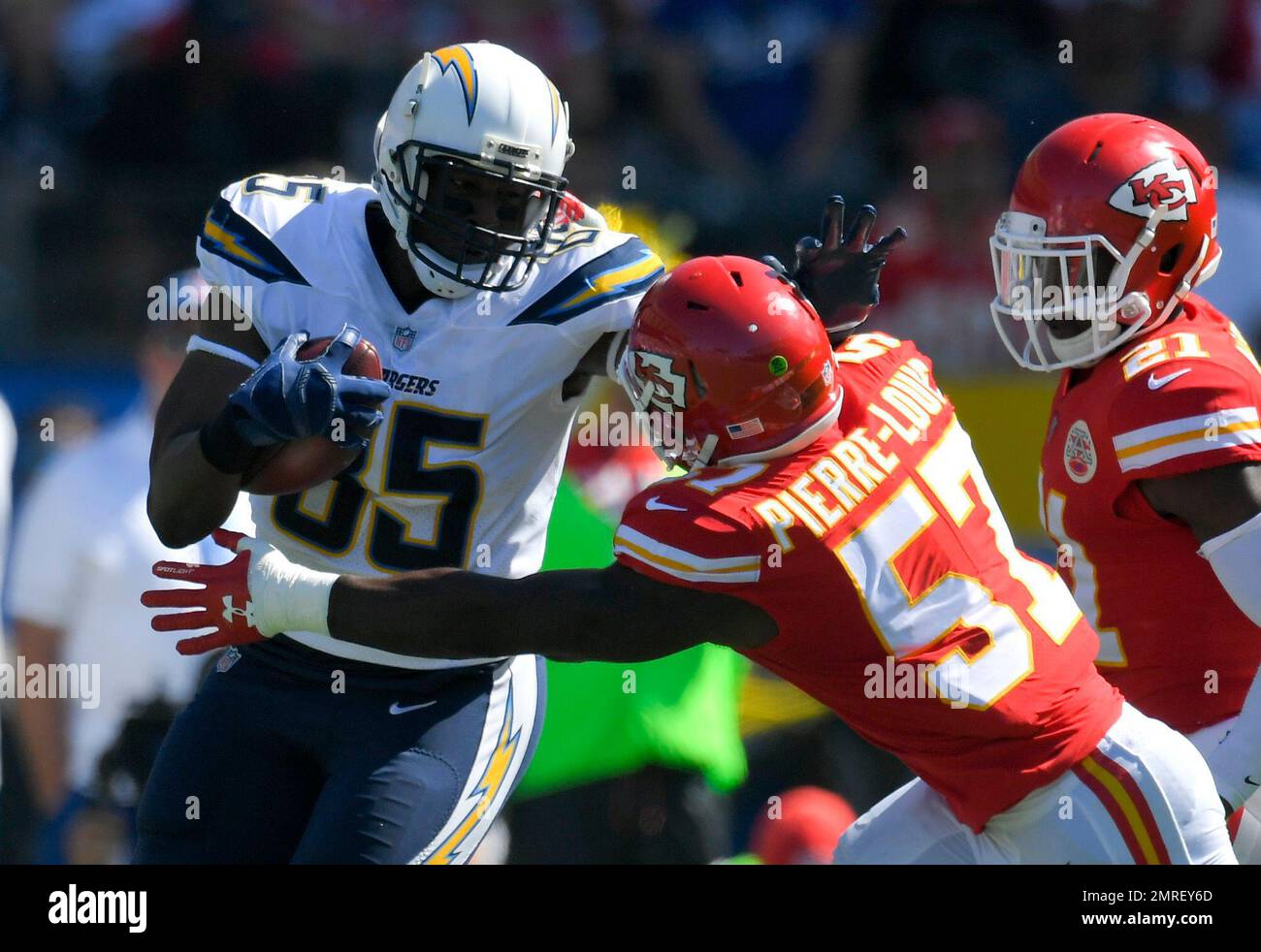 Los Angeles Chargers tight end Antonio Gates, left, pushes aside Kansas ...