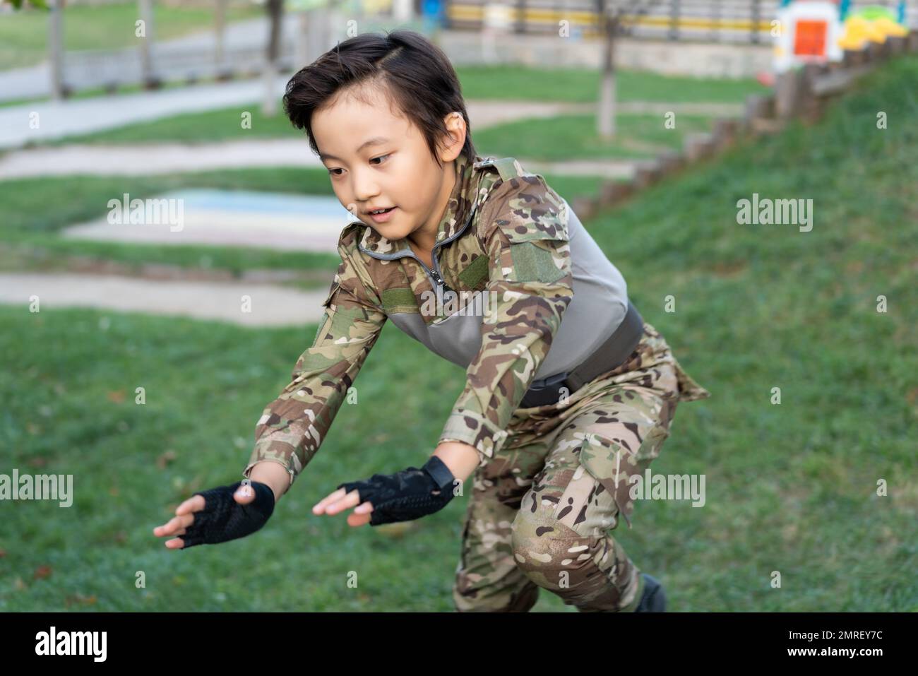 Happy boy playing cs Stock Photo - Alamy