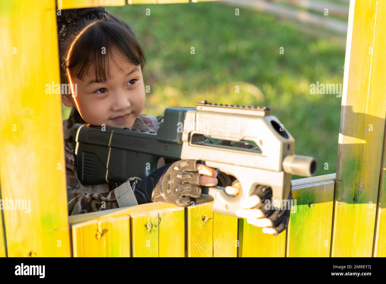 Happy girl playing cs Stock Photo - Alamy