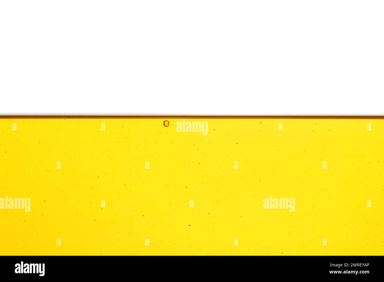 Cooking oil flow isolated on white. Color liquid Stock Photo - Alamy