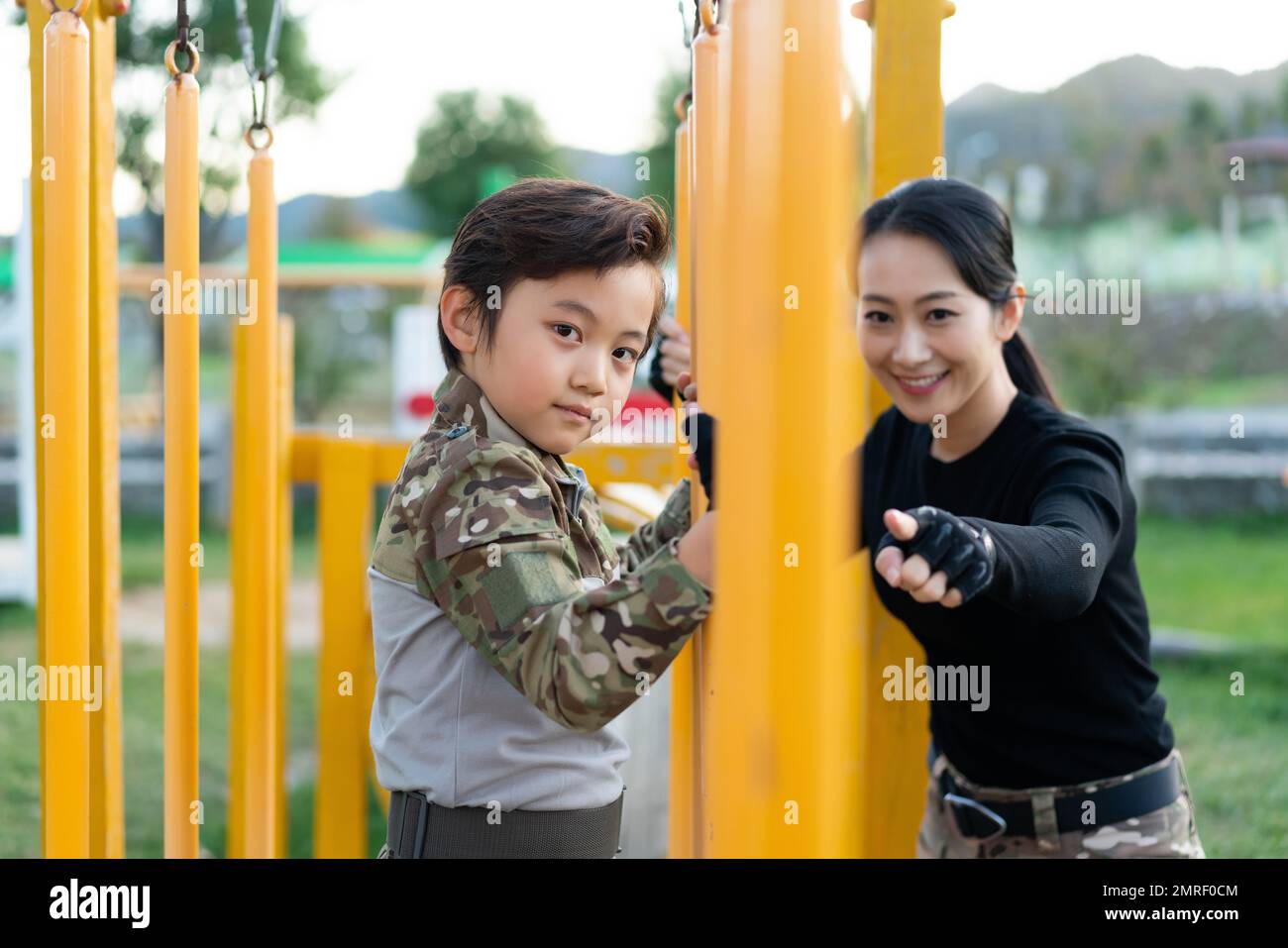 Happy mother and son play cs Stock Photo - Alamy