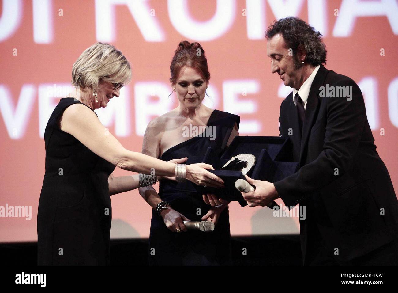Actress Julianne Moore appears very happy as she receives the Marc ...