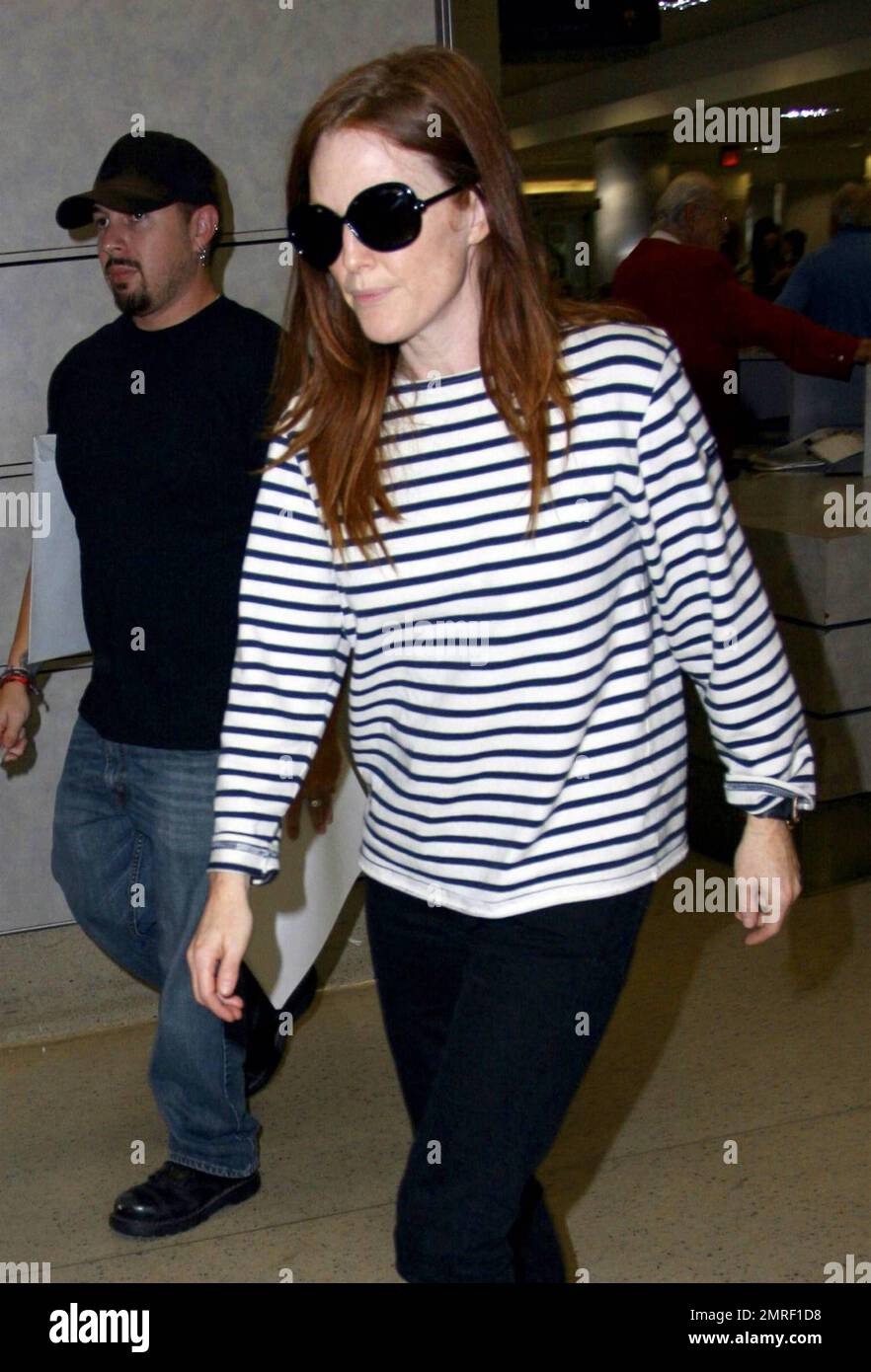 EXCLUSIVE!! Actress Julianne Moore looks tired as she arrives at LAX ...