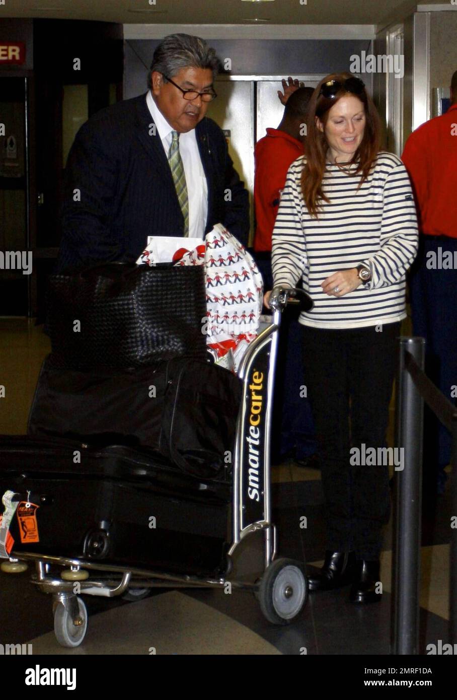 EXCLUSIVE!! Actress Julianne Moore looks tired as she arrives at LAX ...