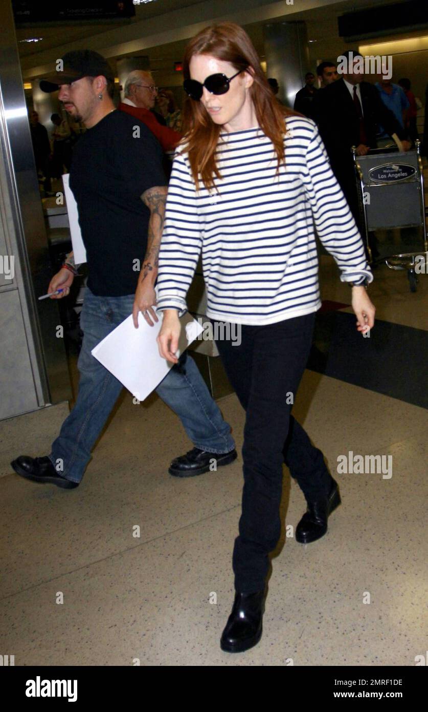 EXCLUSIVE!! Actress Julianne Moore looks tired as she arrives at LAX ...