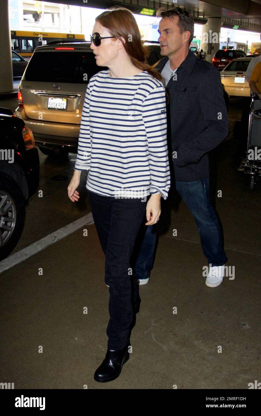 EXCLUSIVE!! Actress Julianne Moore looks tired as she arrives at LAX ...