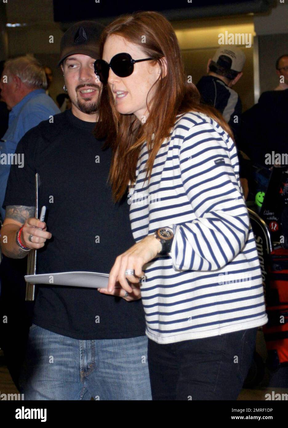 EXCLUSIVE!! Actress Julianne Moore looks tired as she arrives at LAX ...