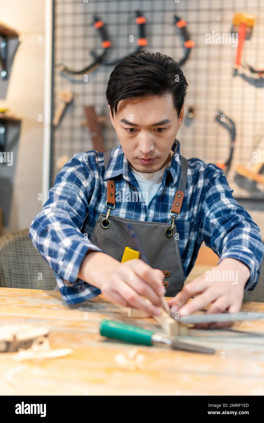 The young man a carpenter Stock Photo - Alamy